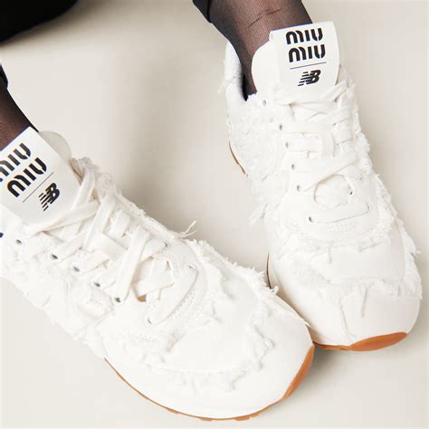 Baskets 574 New Balance X Miu Miu En Denim Blanc Miu Miu