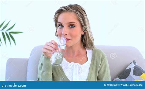 Woman Holding A Glass Of Water Stock Footage Video Of Blonde Couch 40063530