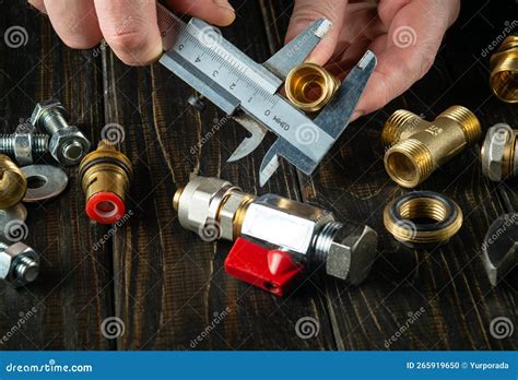 Measuring The Diameter Of A Fitting With A Caliper In The Hands Of A Master Plumber Copy Space