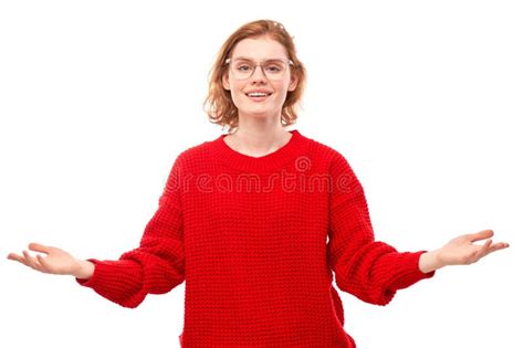 Portrait Of Happy Young Redhead Woman Spreading Hands With Joy And