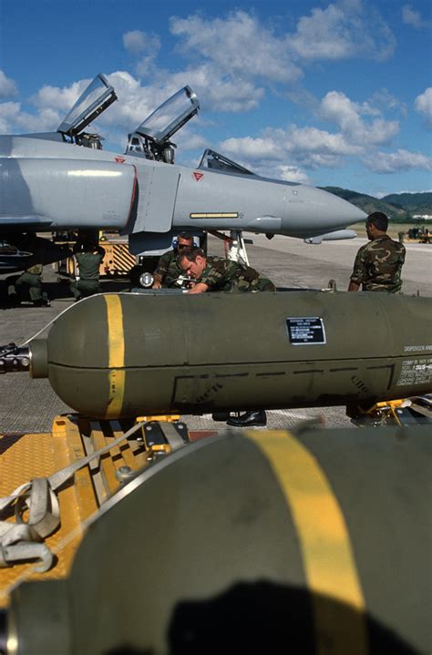 Munitions Personnel Prepare Cbu 58ab Cluster Bombs For Loading On A