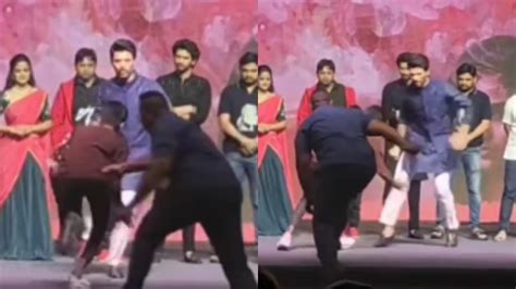 On Camera Vijay Deverakondas Fan Jumps On Stage To Touch His Feet Actors Reaction Goes Viral