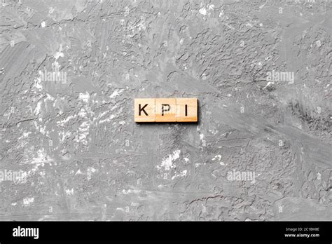 Kpi Word Written On Wood Block Key Performance Indicators Text On Table Concept Stock Photo