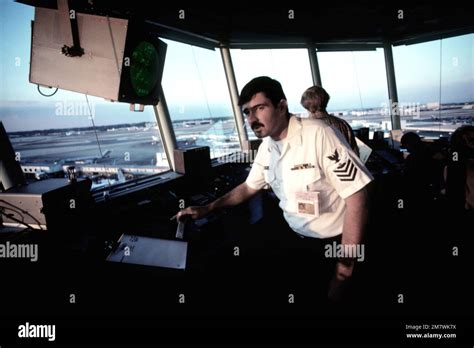 Air Controlman 1st Class Dave Atkins Helps Direct Air Traffic From The