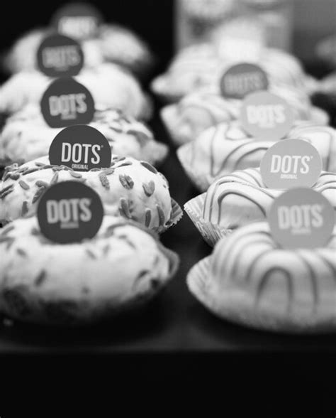 Premium Photo An Evocative Image Captures The Essence Of Dots Original Pastry Donut