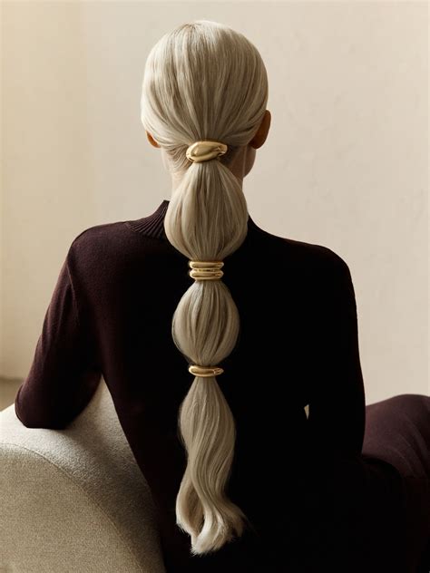 Резинка для волос с золотистым декором Lichi Online Fashion Store