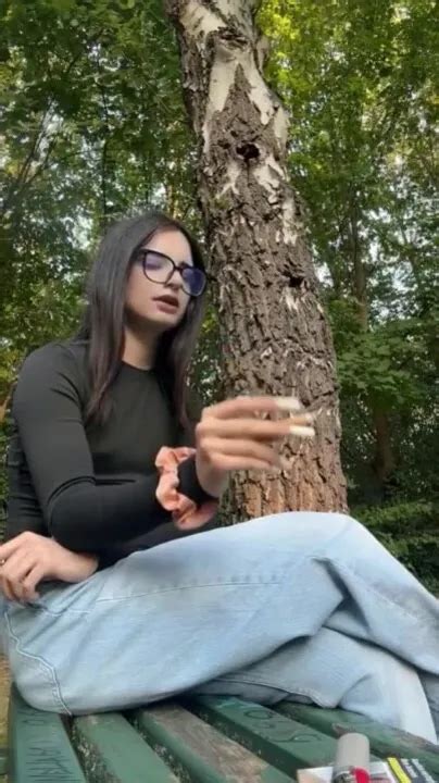 Litter Girl Litters Empty Cigarette Pack