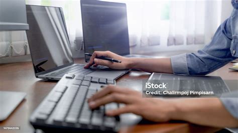 Development Programmer Writing A Code On Database Teamwork Cooperation