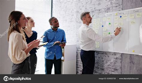 Agile Business Team Using Kanban Task Board Stock Photo AndreyPopov 635932726
