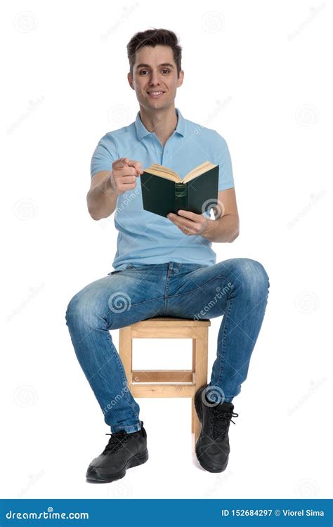 Handsome Casual Man Pointing And Holding A Book Stock Image Image Of Read Background 152684297