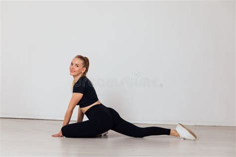 Beautiful Blonde Woman Doing Physical Fitness Exercises Stock Image