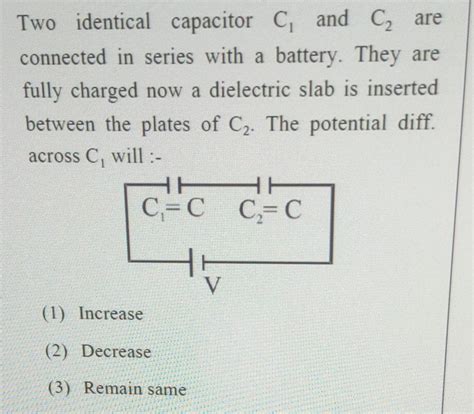 [answered] Two Identical Capacitor C And C Are Connected In Series With Kunduz