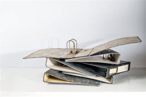 Old Empty File Folders Or Ring Binders On A White Office Desk In An