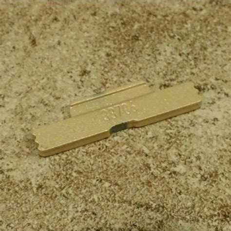 GLOCK GEN OEM SLIDE LOCK G G GOLD CERAKOTE MM LOWER