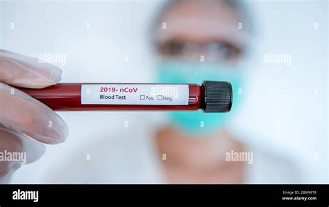 Asian Woman Covid 19 Test And Laboratory Sample Of Blood Testing For Asian Woman Covid 19 Test And Laboratory Sample Of Blood Testing For