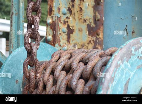 Rusty Chains On An Old Cog Stock Photo Alamy