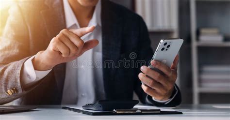 Young Business Asian Woman Using A Calculator To Tax Deduction Planning