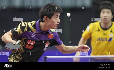 Chinese Table Tennis Player Jike Zhang L Performs His Skills During The World Table Tennis