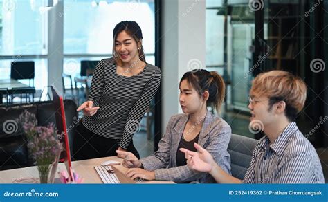 Software Developers Colleagues Discussing And Working On Web Site Project Together At Startup