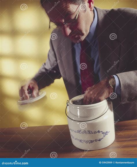 Man With Hand In Cookie Jar 1 Stock Image Image Of Businessman