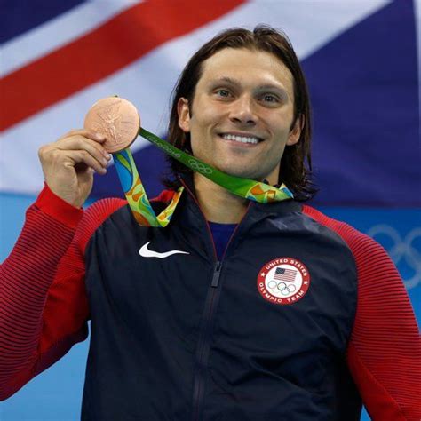 Nia Ali Takes Her Victory Lap At The Olympics With Her Adorable Son Titus Nia Ali Cody