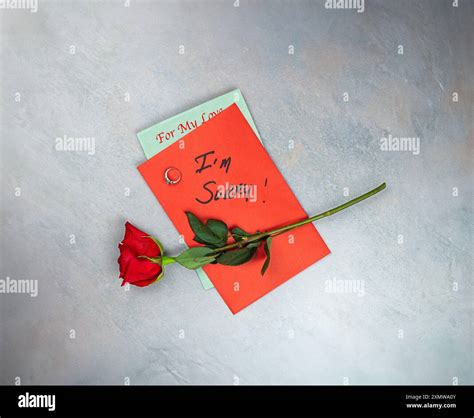 Wedding Ring With Im Sorry Note And Wilted Rose Covering Valentine