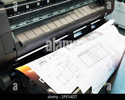 Large Format Plotter And Printed Drawings Floor Plans Stock Photo Alamy