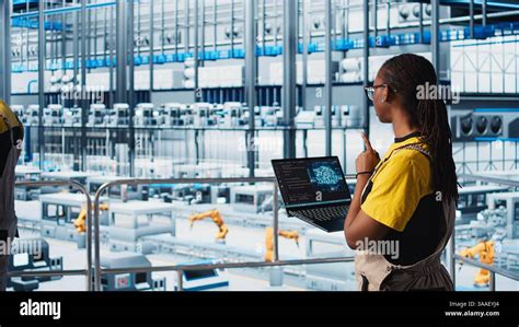 Engineer In Smart Factory Using Augmented Reality To Collect Data On