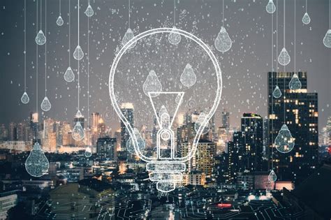 Lightbulb Outline And Binary Code Overlaying Urban Cityscape At Night