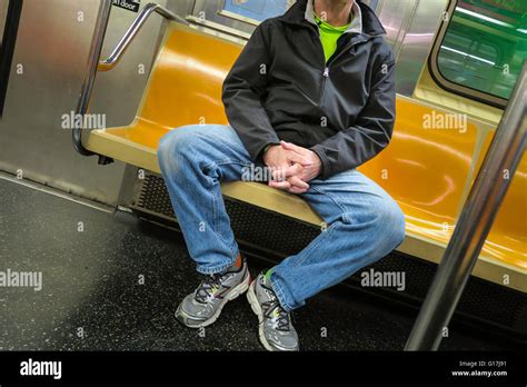 Man Hogging More Than One Seat Man Spreading On New York City Subway Tube Nyc Usa Stock