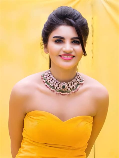 Jabardasth Varsha In Yellow Gown Photoshoot South Indian Actress
