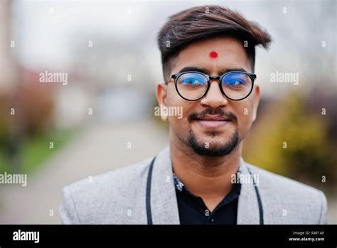 Close Up Head Of Stylish Indian Man With Bindi On Forehead And Glasses