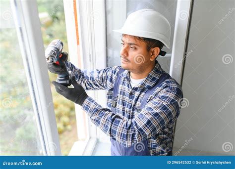 Indian Service Man Installing Window With Screwdriver Stock Photo Image Of Work Window 296542532