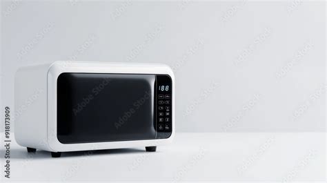 Closeup Of A Sleek Compact Mini Microwave With A Digital Display And