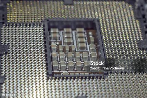 Engineer Plugging Cpu Microprocessor To Motherboard Socket Computer Technology And Hardware