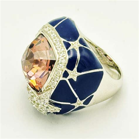A Vintage Belle Etoile Designer Ring Set With Large Pink Stone And Blue