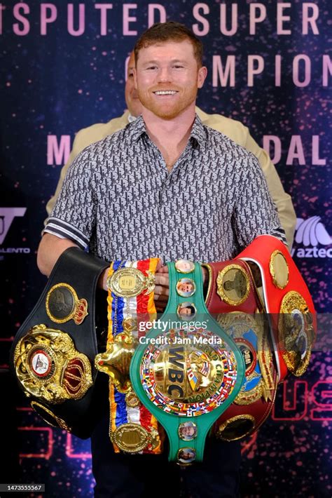 Saul Canelo Alvarez Poses With His Belts During The Press Conference