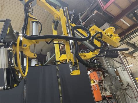 Industrial Manipulator With A Custom Tire Handler Gci