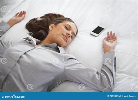 No More Work Today Shot Of A Young Businesswoman Passed Out On A Bed