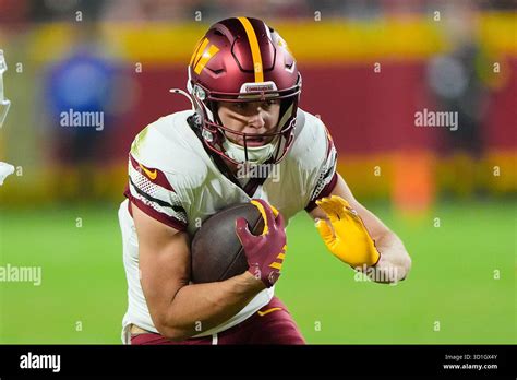 Washington Commanders Wide Receiver Luke Mccaffrey Runs The Ball During