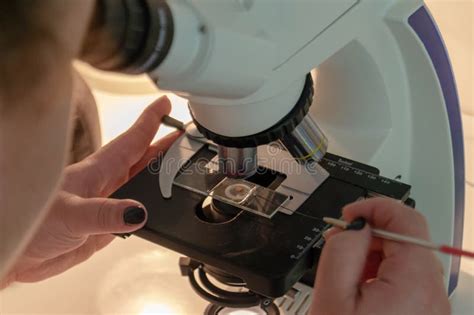 The Girl In The Lab Works With A Microscope Stock Image Image Of Focus People 147758927