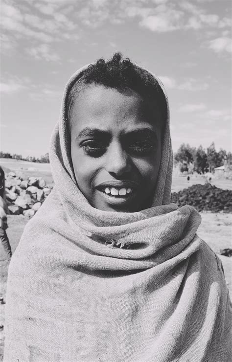 A Man With A Scarf Around His Neck Photo Free North Gondar Image On Unsplash