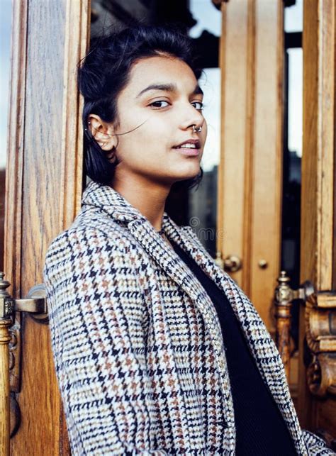 Young Pretty Student Teenage Indian Girl In Doors Happy Smiling Having