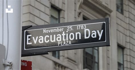 A Black And White Sign That Says Evaculation Day Photo Free Grey