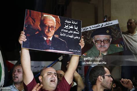 Jordanians Look On As The Body Of Tariq Aziz Arrives In Amman Jordan