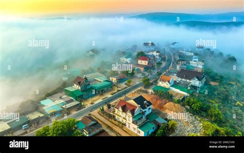 Aerial View Of Xuan Tho Suburbs Near Da Lat City At Morning With Misty
