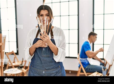 Paint Student Woman Smiling Happy Holding Paintbrushes At Art School