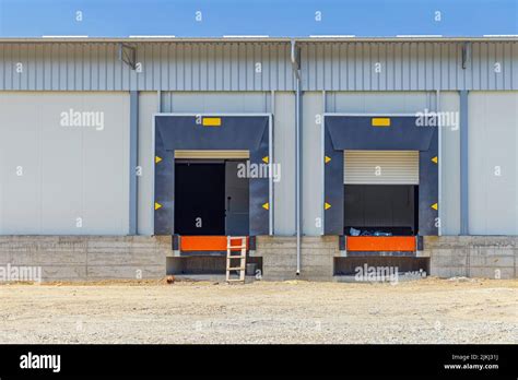 Wooden Ladder At Loading Dock Doors Warehouse Building Exterior Stock
