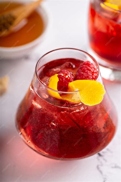 Premium Photo Raspberry Honey And Lemon Cocktail Or Mocktail