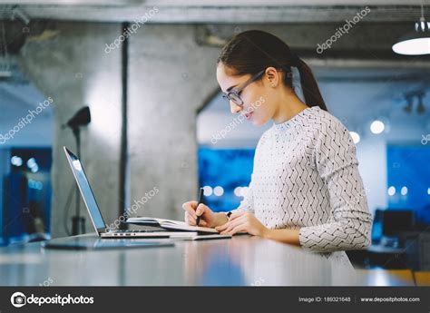 Clever Female Scientist Making Notes Clinic Testing Making Report Using